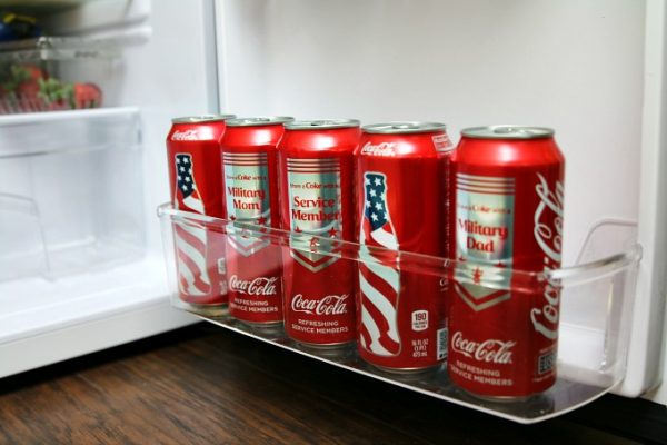 Coke cans inside fridge - Life. Family. Joy